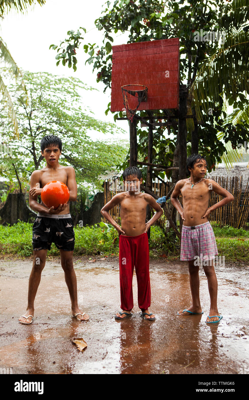 PHILIPPINES, Palawan, Puerto Princesa, Ian, Marvin and Nestor play ...
