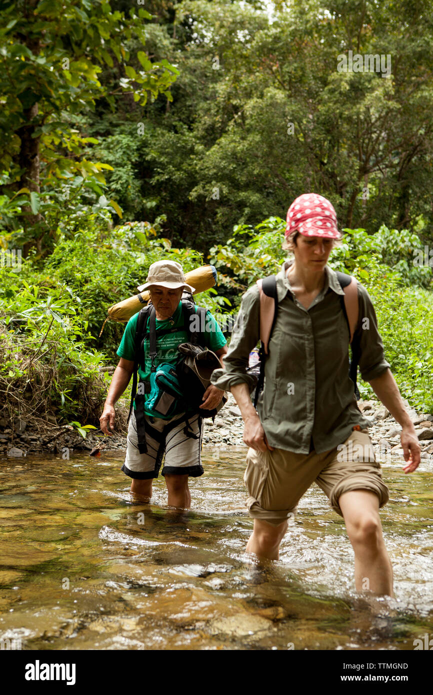 PHILIPPINES, Palawan, Barangay region, hiking through the jungle to ...