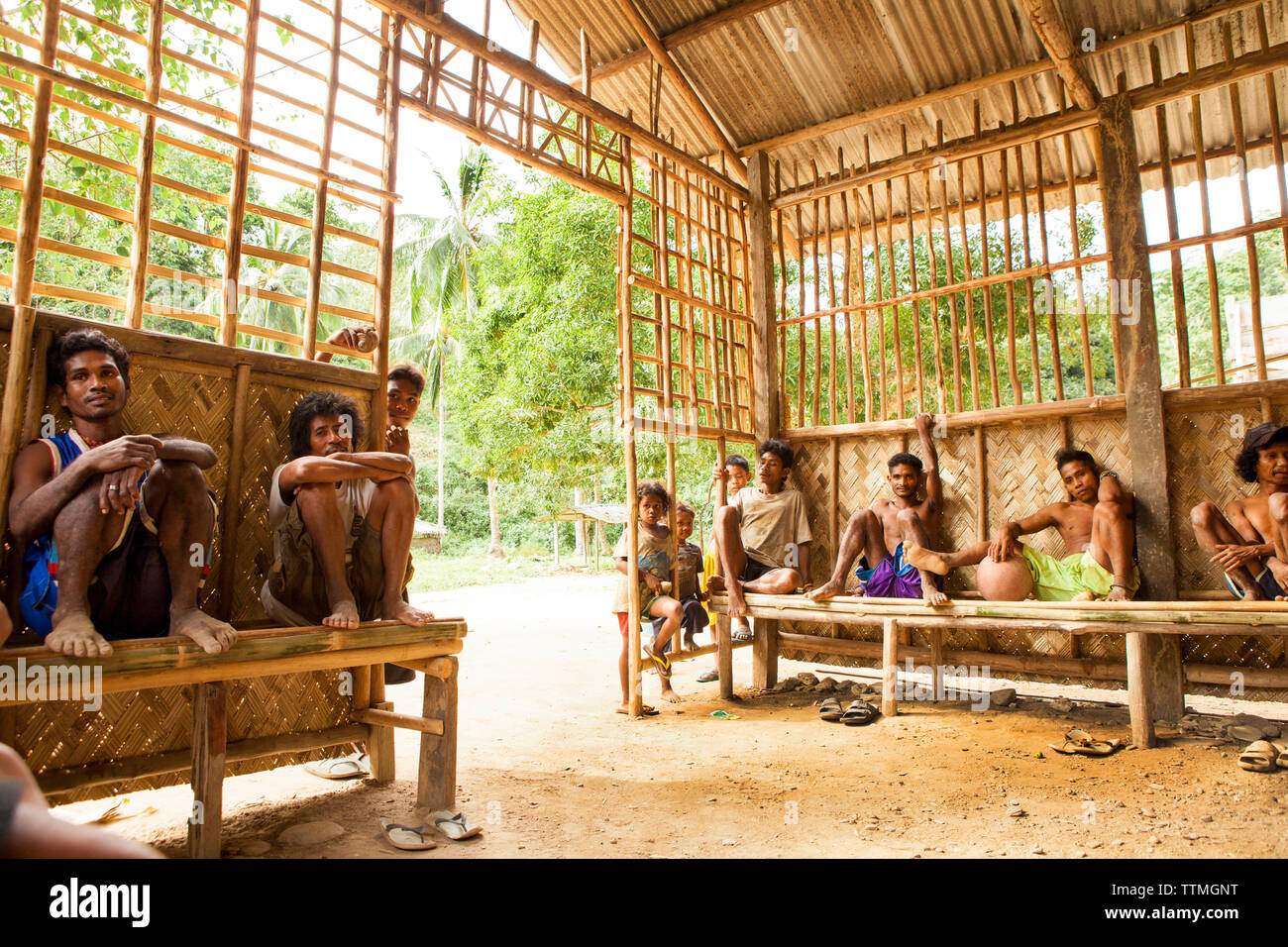 PHILIPPINES, Palawan, Barangay region, Batak men seek shelter from the ...
