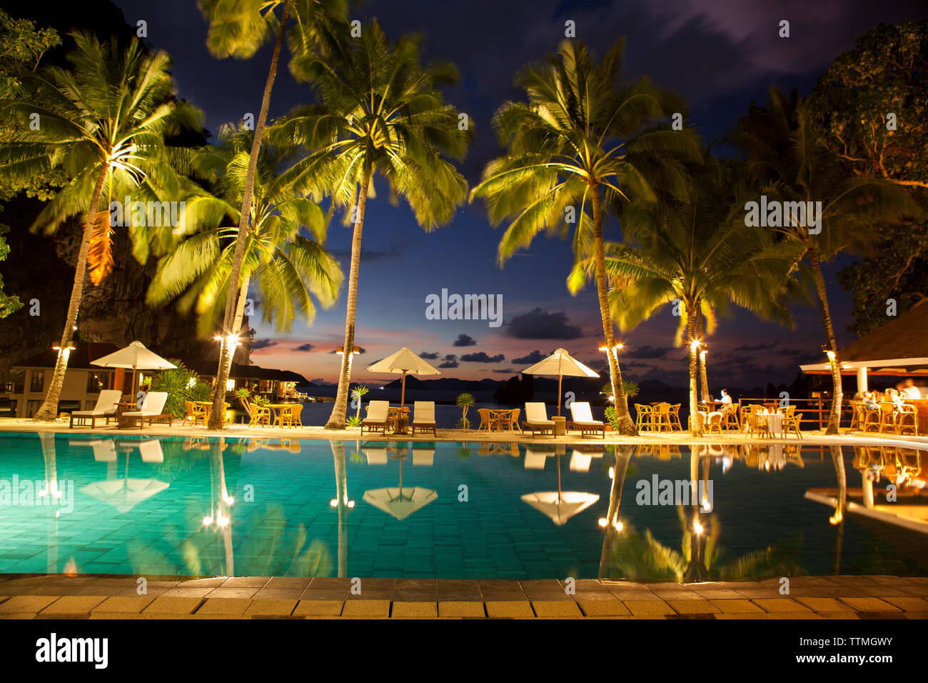PHILIPPINES, Palawan, El Nido, poolside view at the Lagen Island resort ...