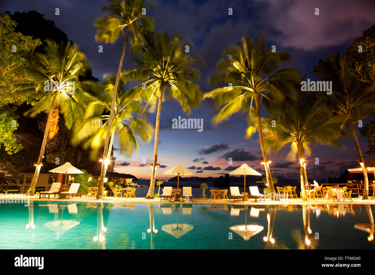 PHILIPPINES, Palawan, El Nido, poolside view at the Lagen Island resort ...