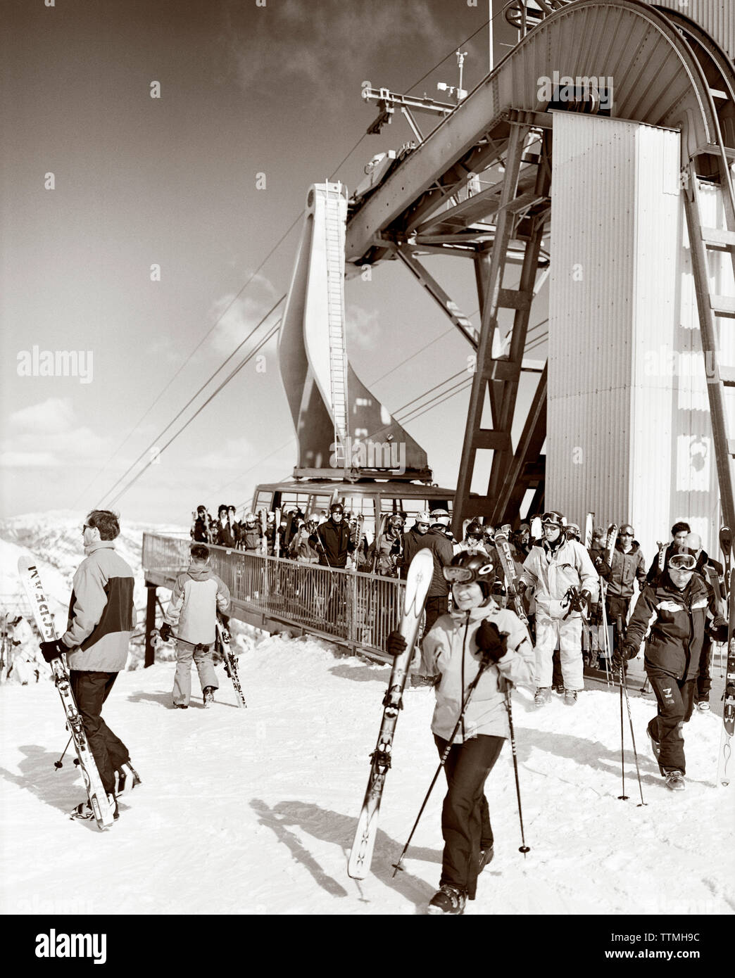 USA, Utah, skiers getting off of the tram, Snowbird Ski Resort (B&W ...