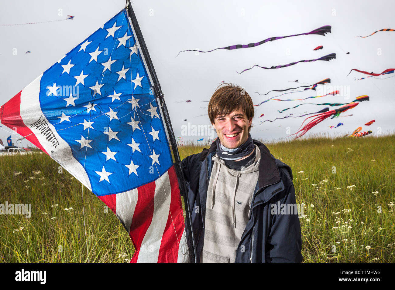 USA, Washington State, Long Beach Peninsula, portrait of kite flyer ...