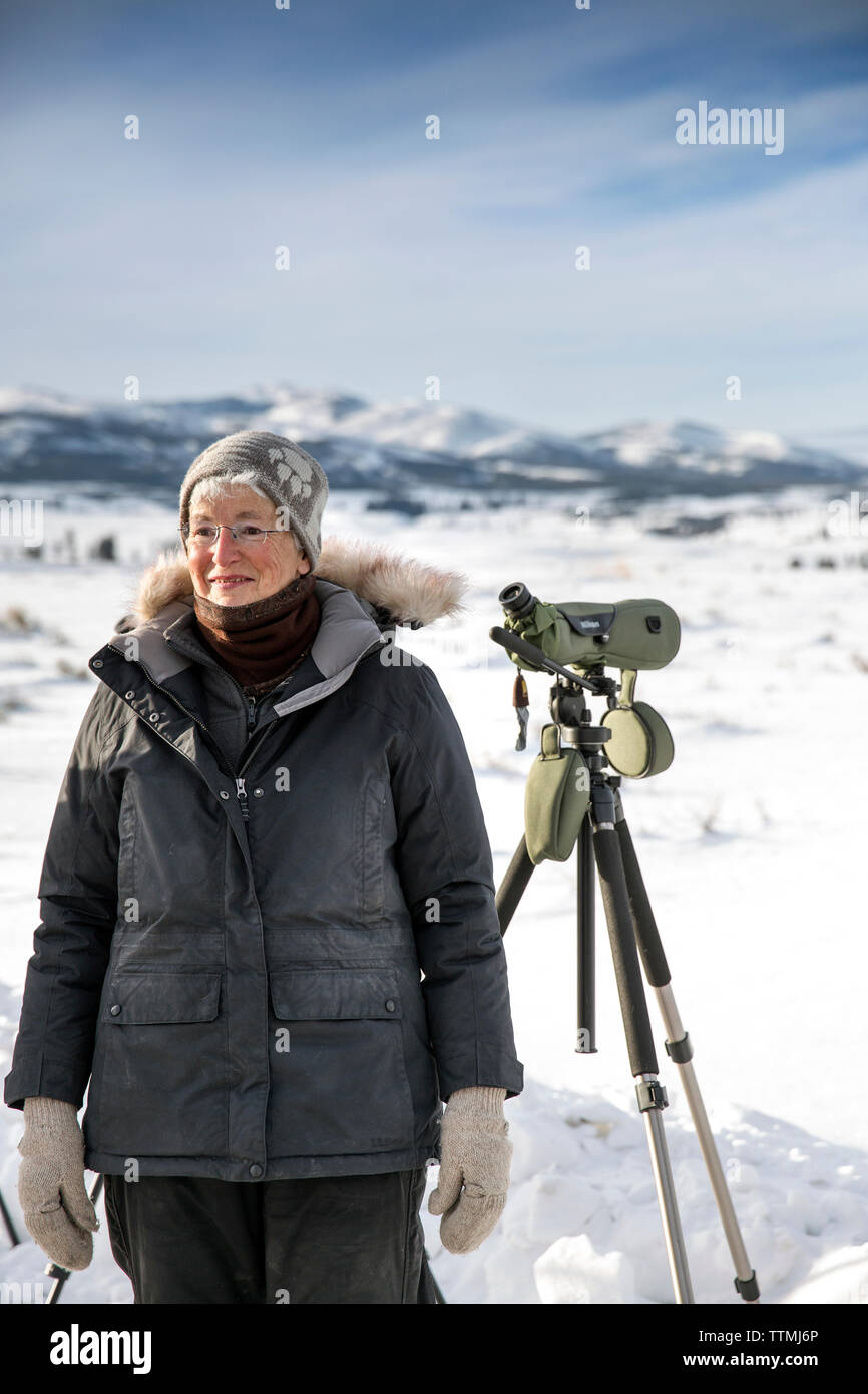 USA, Wyoming, Yellowstone National Park, wolf-watcher Kirsty Peake ...