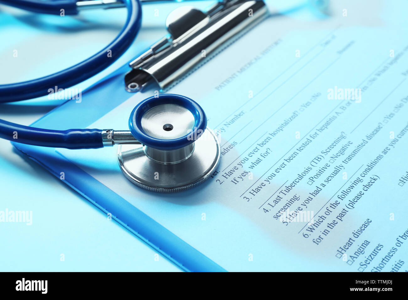 Stethoscope and patient medical history Stock Photo - Alamy