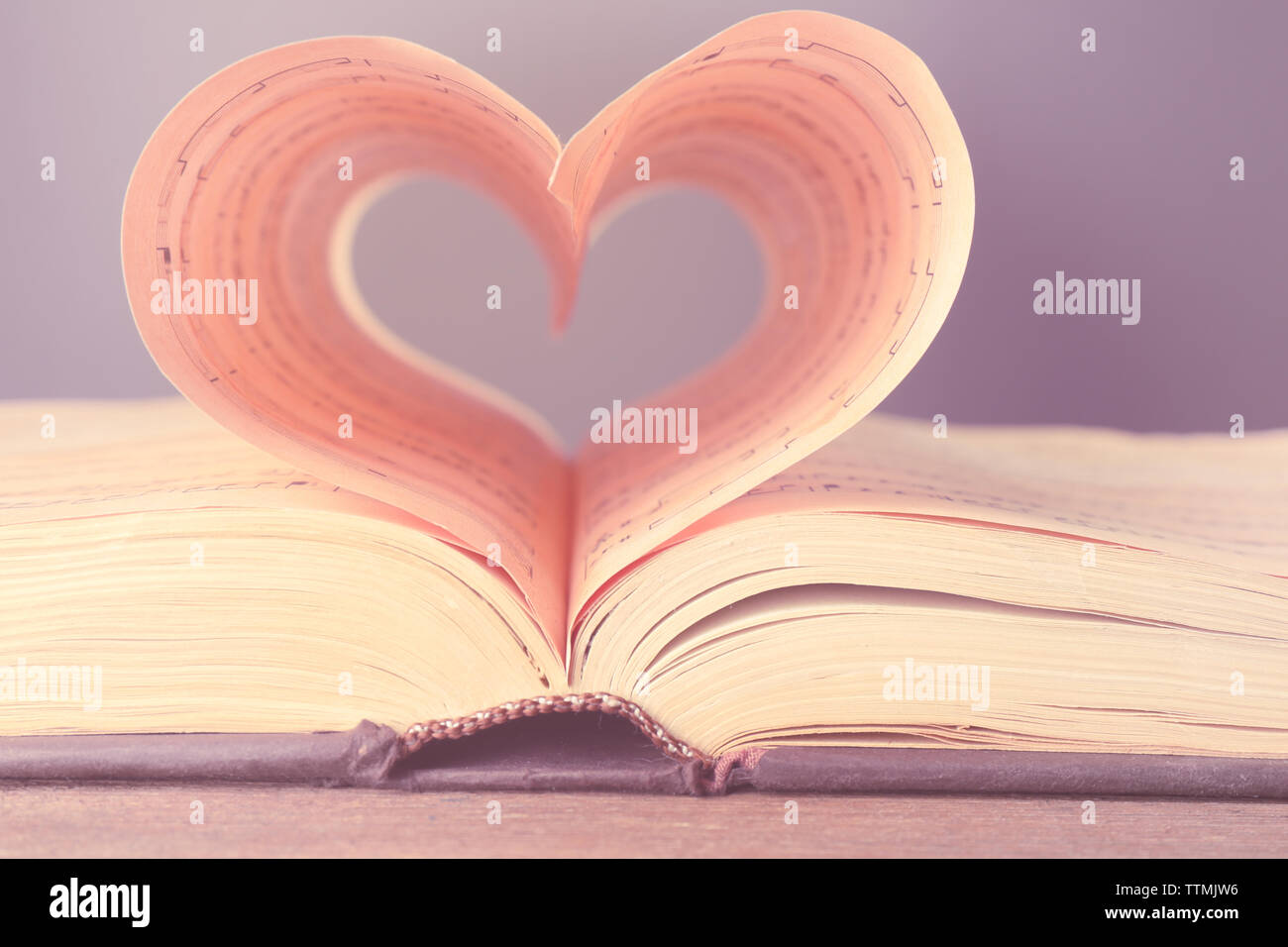 Heart shaped music notes sheets Stock Photo - Alamy