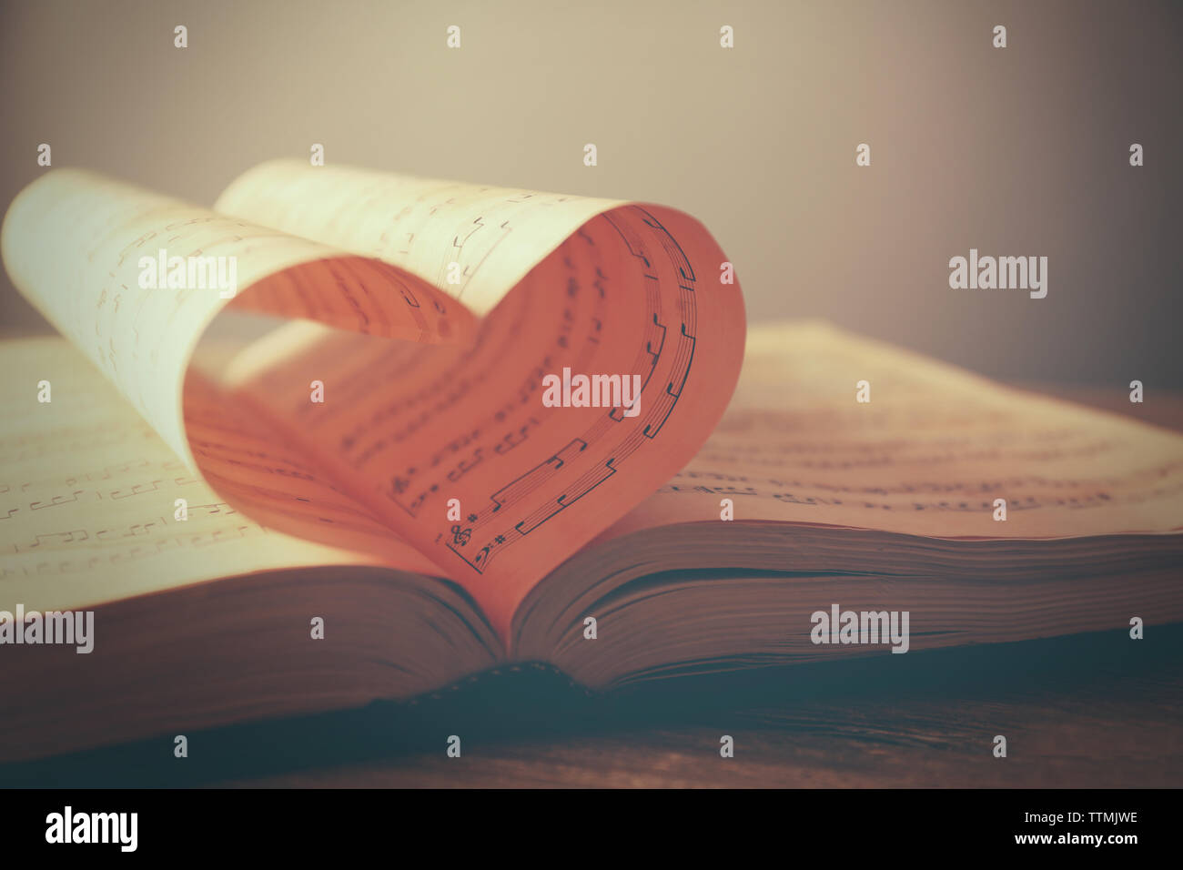 Heart shaped music notes sheets Stock Photo - Alamy