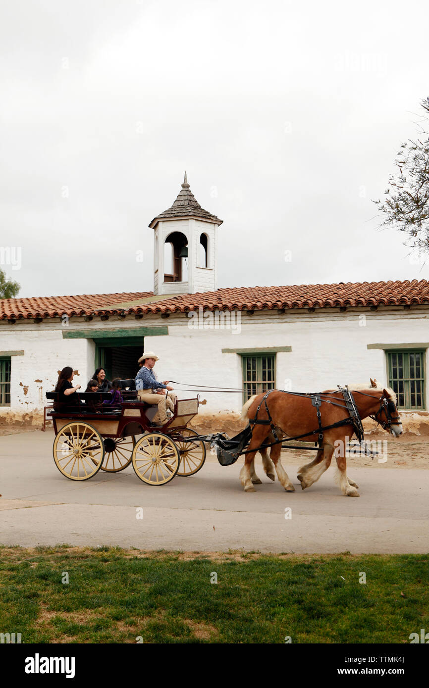 USA, California, San Diego, a family on a horse and carriage ride in ...