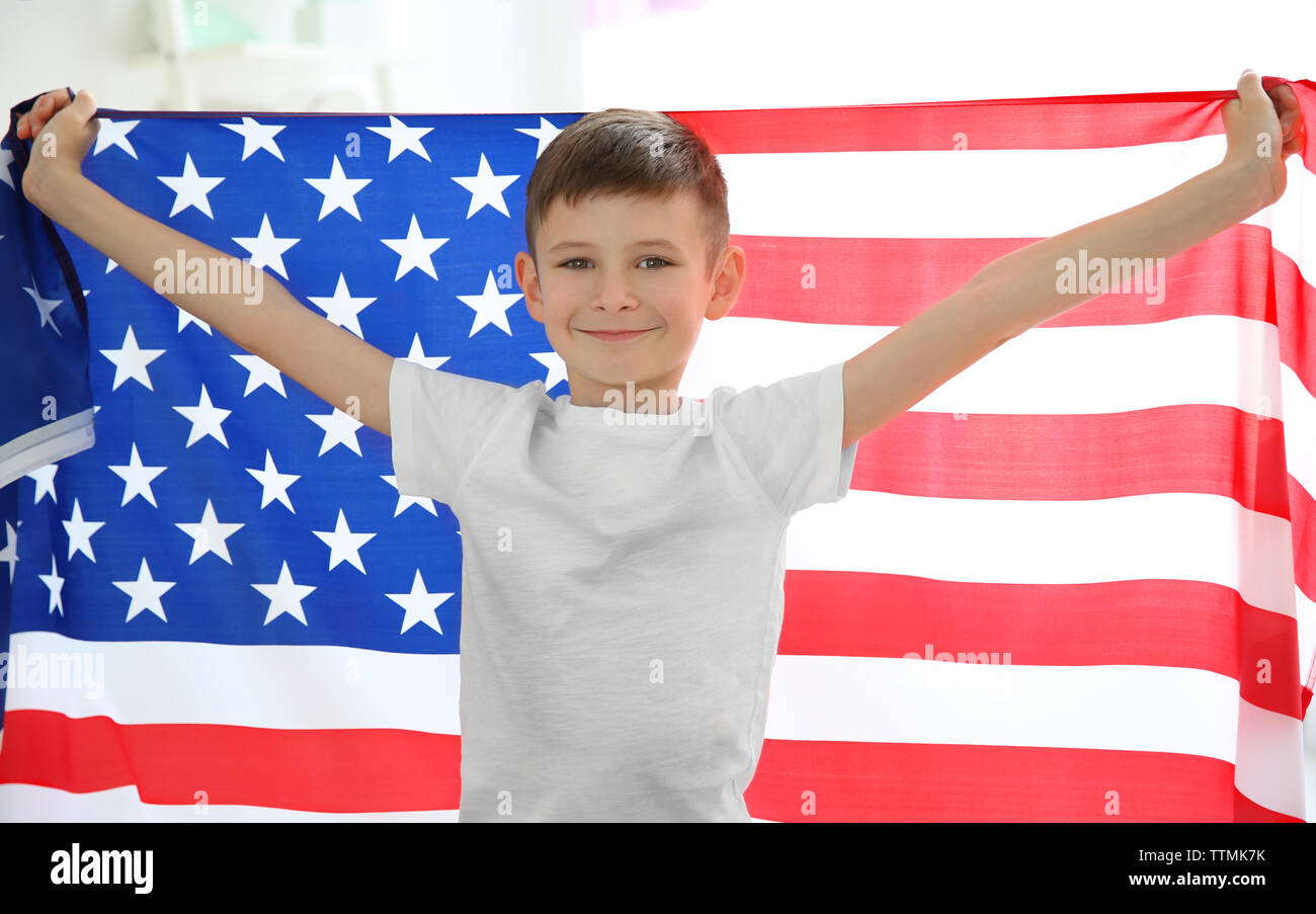 Boy holding american flag hi-res stock photography and images - Alamy