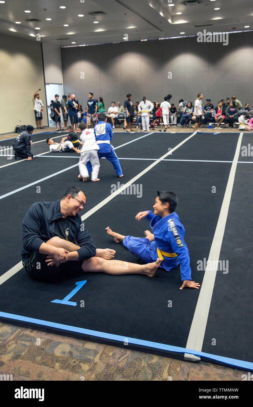 Boy grappling hi-res stock photography and images - Alamy