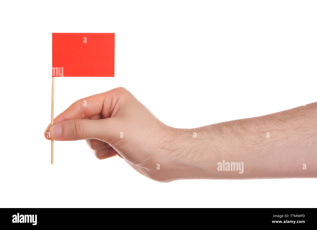 Man hand holding red flag, isolated on white Stock Photo - Alamy