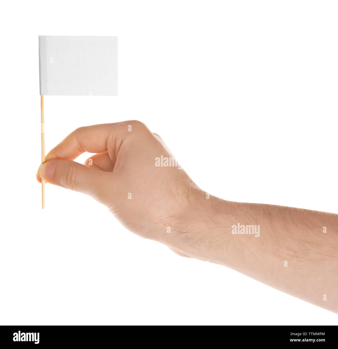 Man hand holding white flag, isolated on white Stock Photo - Alamy