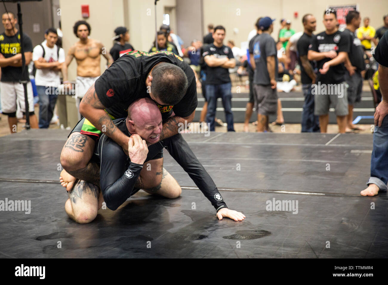 USA, Oahu, Hawaii, Jujitsu Martial Arts fighters grapple at the ICON ...