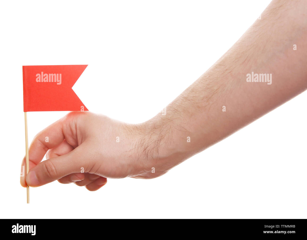 Man hand holding red flag, isolated on white Stock Photo - Alamy