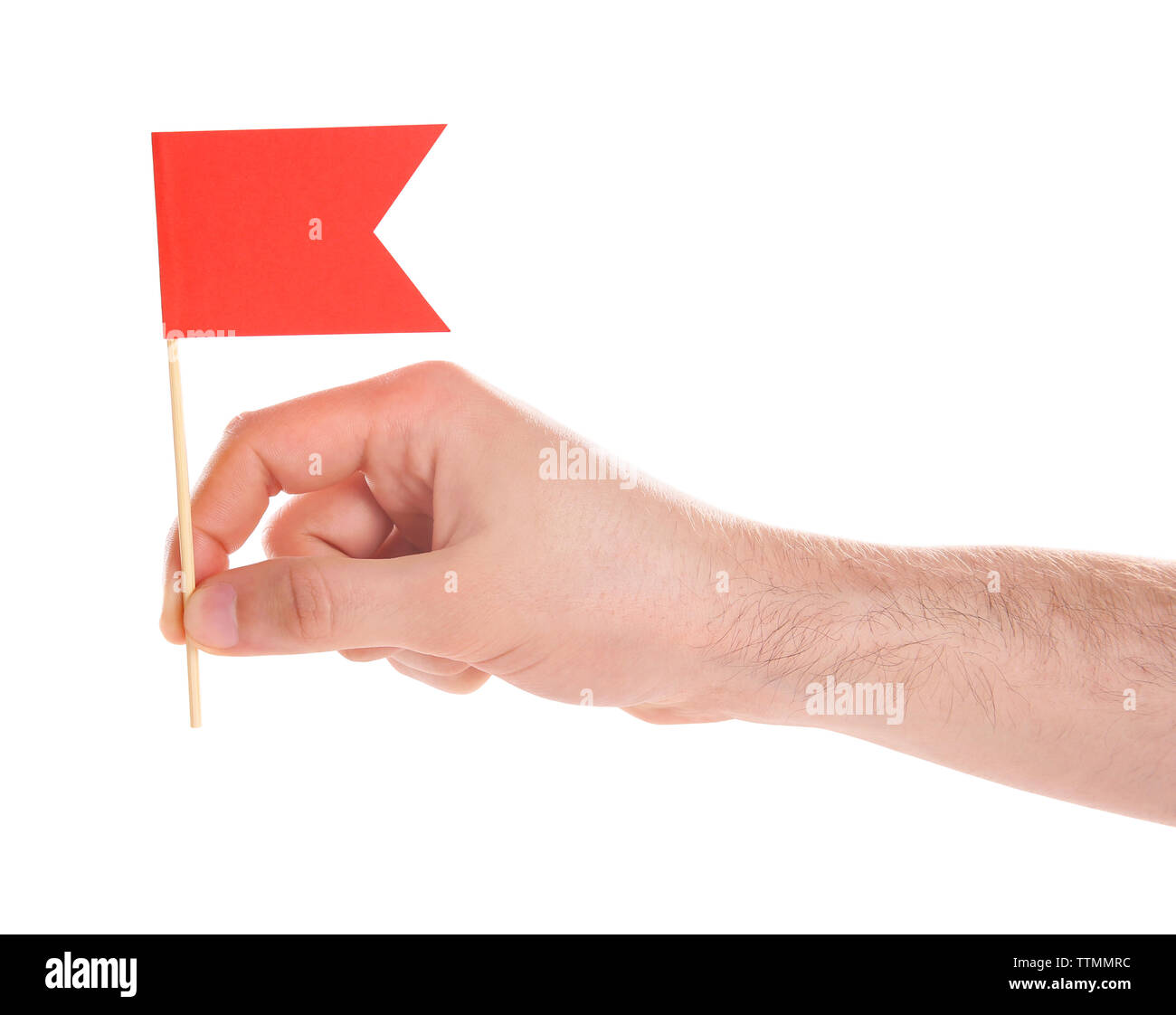 Man hand holding red flag, isolated on white Stock Photo - Alamy