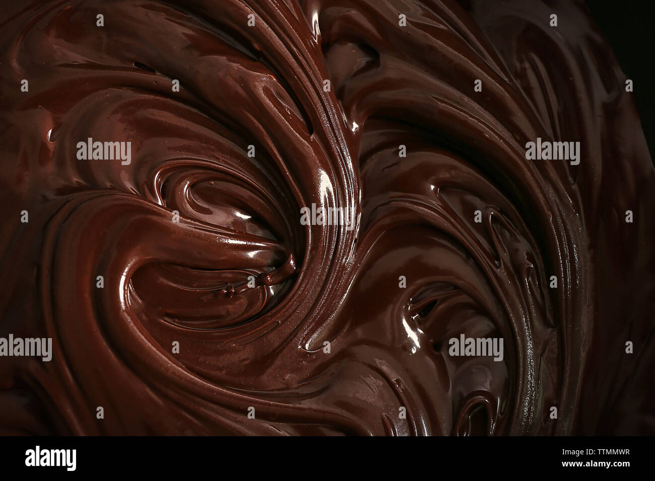 Melted chocolate background Stock Photo - Alamy