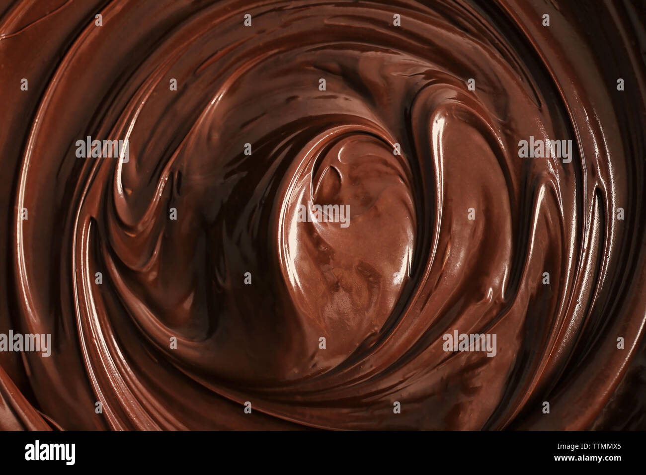 Melted chocolate background Stock Photo - Alamy