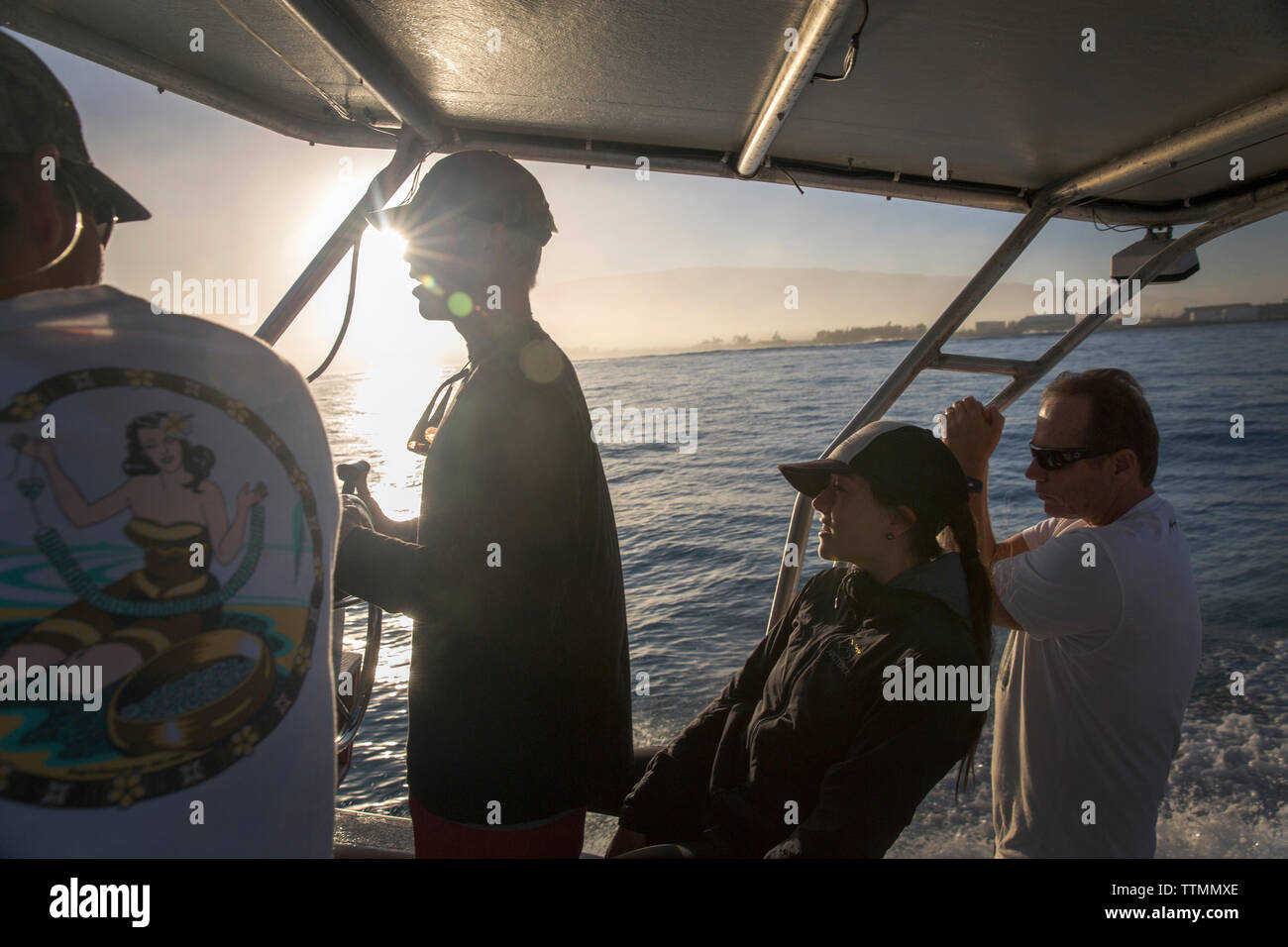 USA, HAWAII, Maui, Jaws, surfers heading out on the boat to Peahi on ...