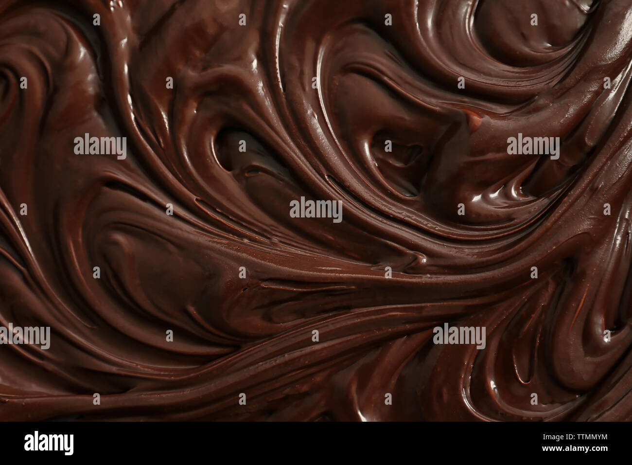 Melted chocolate background Stock Photo - Alamy