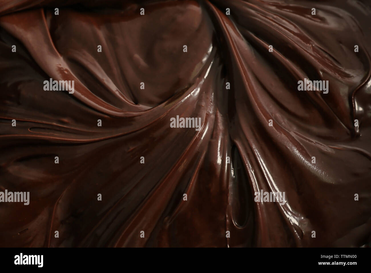 Melted chocolate background Stock Photo - Alamy