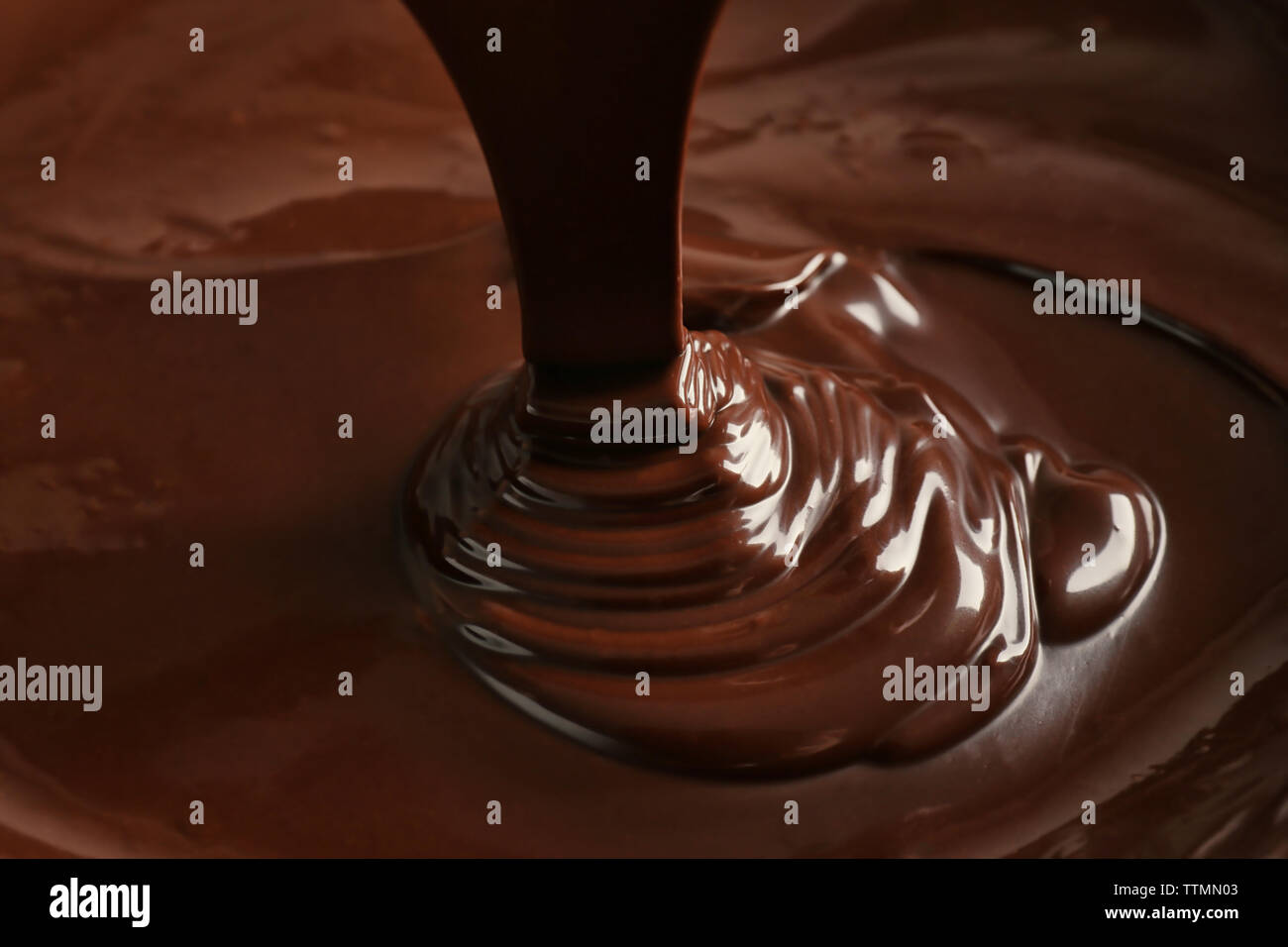 Melted chocolate background Stock Photo - Alamy