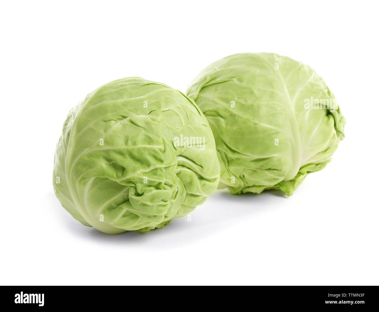 Two cabbage, isolated on white Stock Photo - Alamy