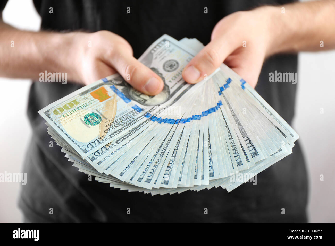 Man counting money, closeup Stock Photo - Alamy