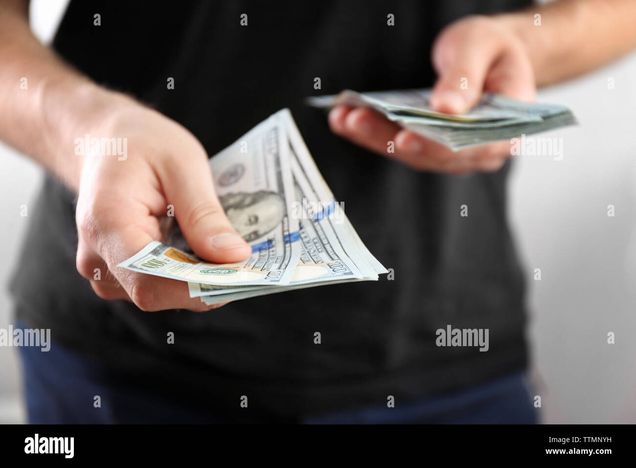 Man counting money, closeup Stock Photo - Alamy