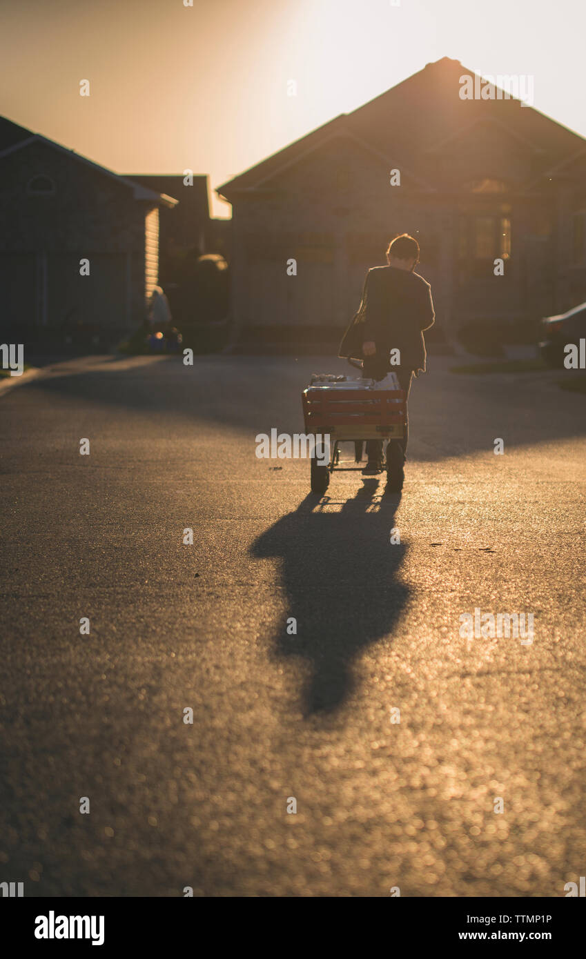 Wheelbarrow walking hi-res stock photography and images - Alamy