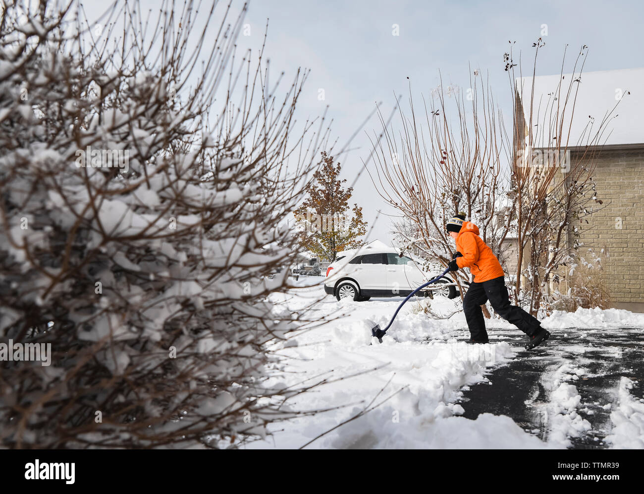 Boy shovel hi-res stock photography and images - Alamy