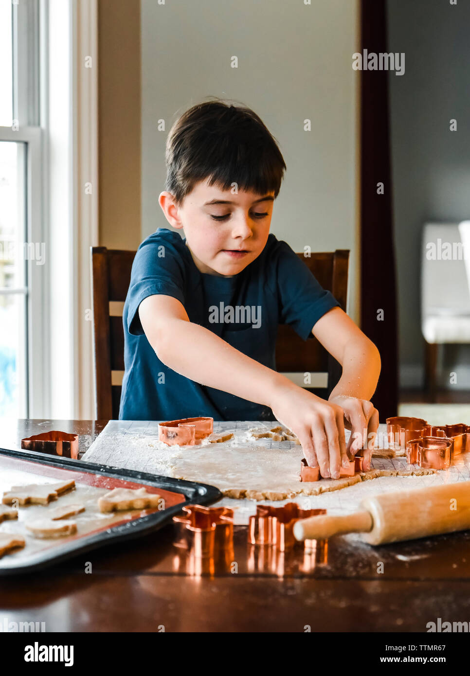 Child making cookies hi-res stock photography and images - Alamy