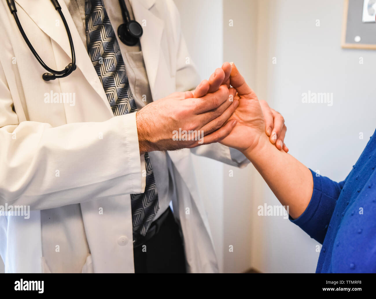 Taking pulse hi-res stock photography and images - Alamy