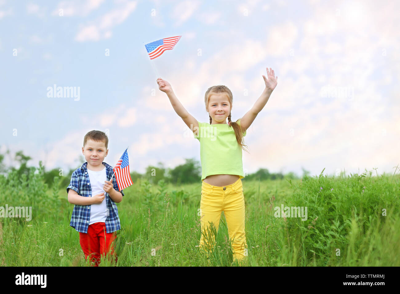 Children and American flag outdoor Stock Photo - Alamy