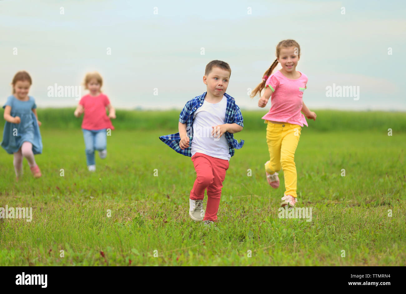 Children having fun outdoor Stock Photo - Alamy