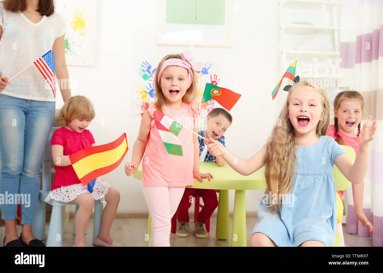 Children with flags in kindergarten Stock Photo - Alamy