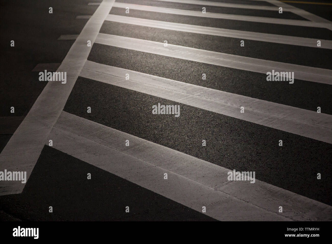 Zebra crossing at night Stock Photo - Alamy