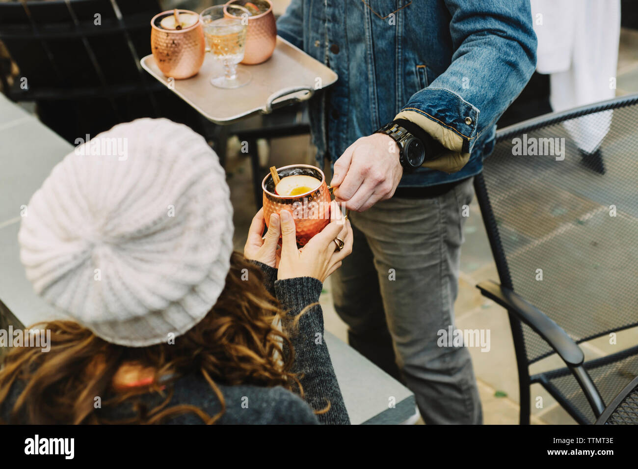 Man serving drinks hi-res stock photography and images - Alamy
