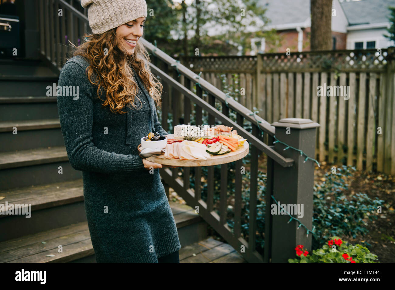 Wooden steps woman young hi-res stock photography and images - Alamy