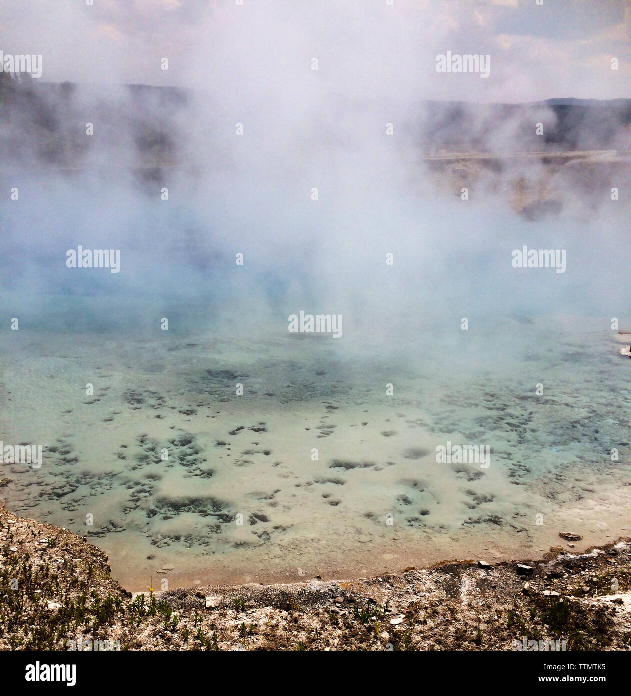 Steam above hot spring Stock Photo - Alamy