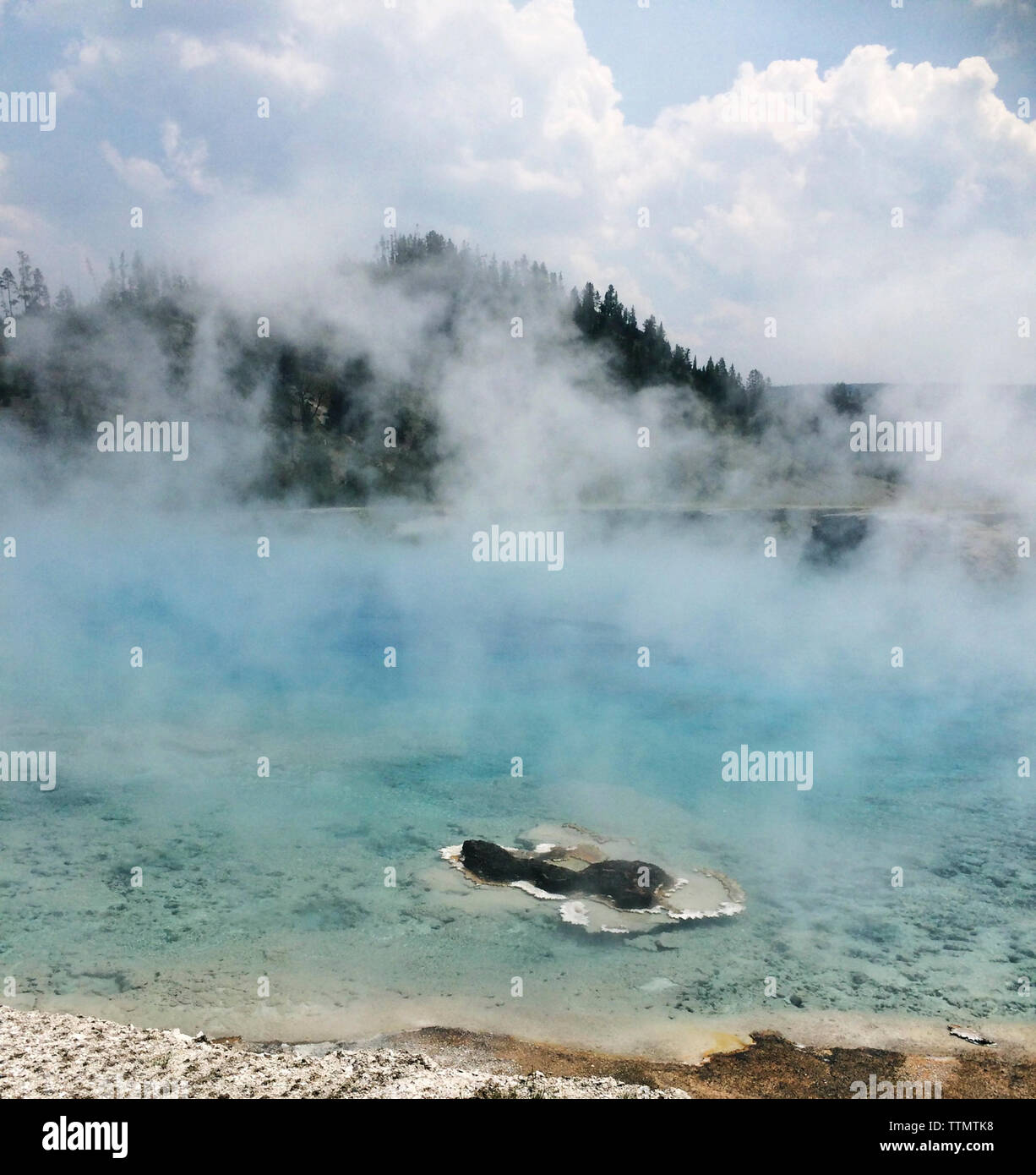 Steam above hot spring Stock Photo - Alamy