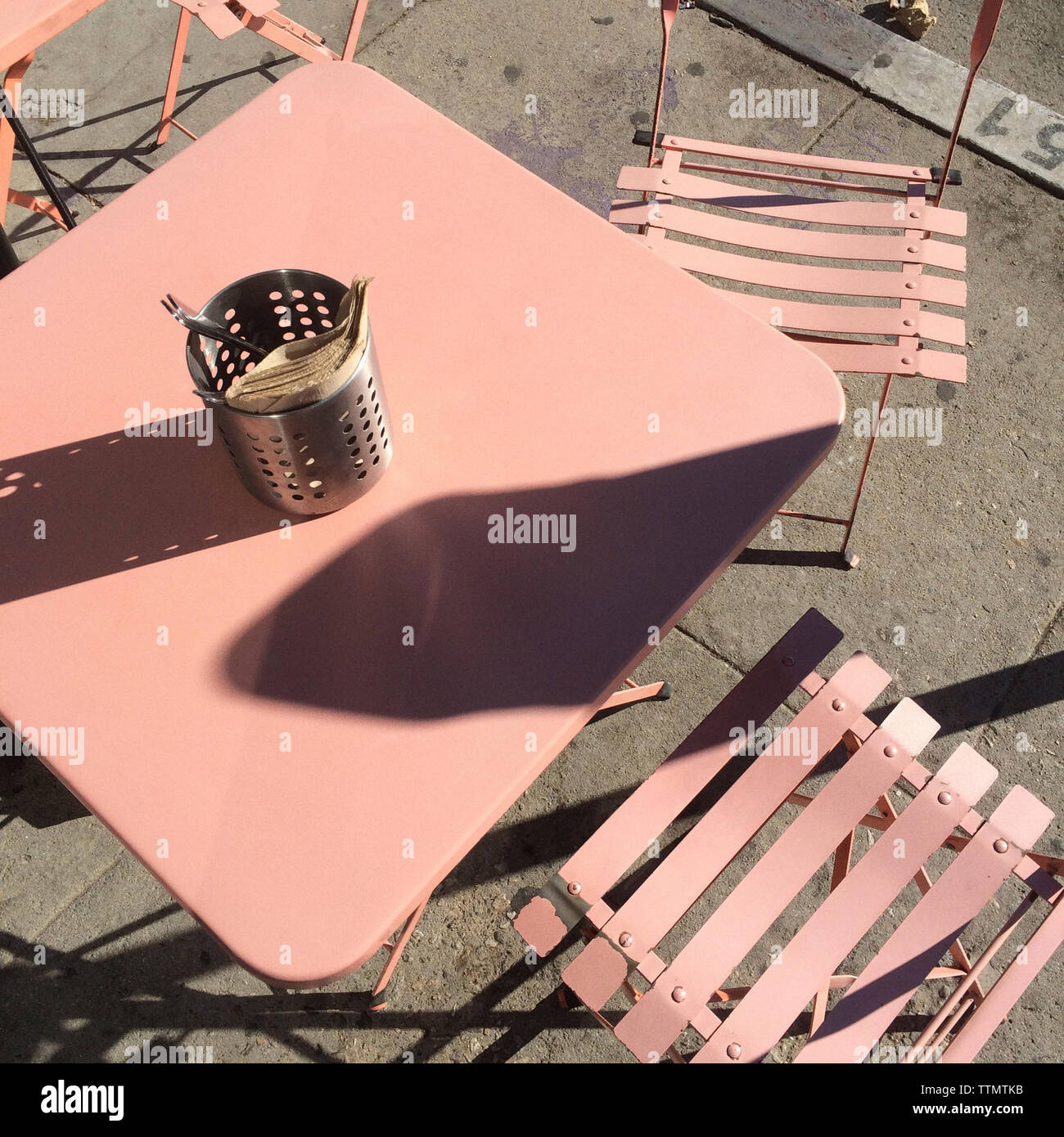 Pink table and chairs outdoor Stock Photo - Alamy