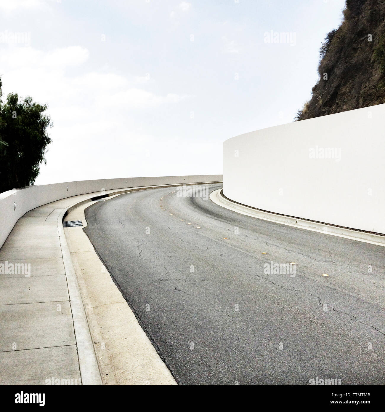 Empty curve road Stock Photo - Alamy