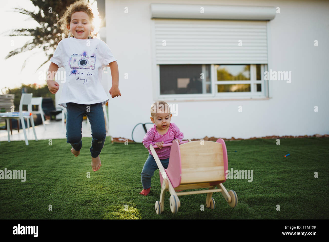 Two girls doll house hi-res stock photography and images - Alamy