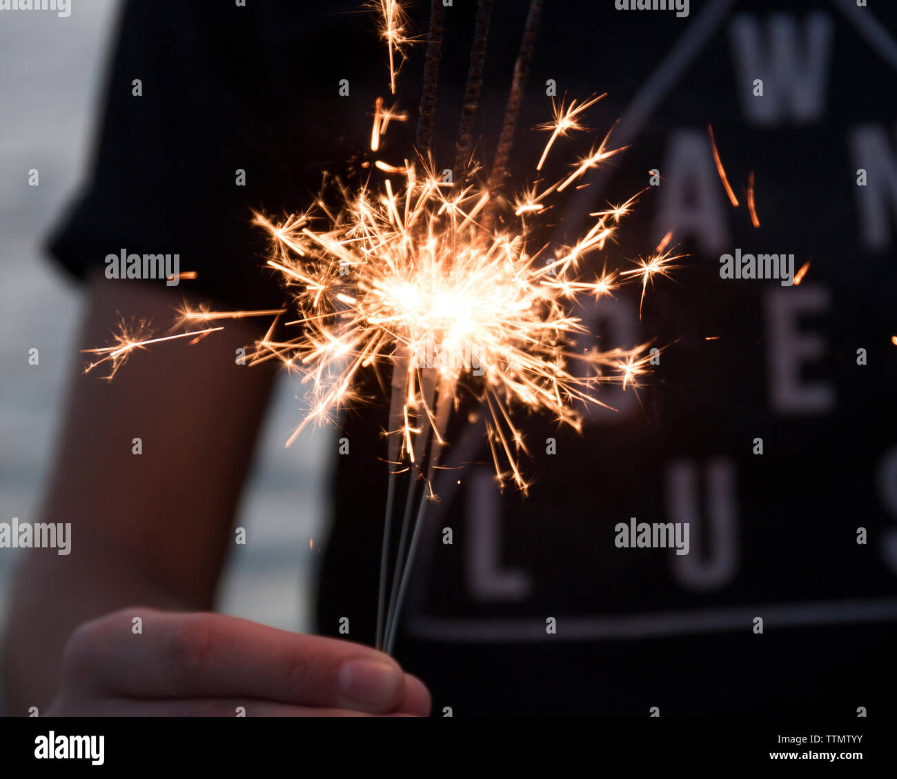 Burning sparklers hi-res stock photography and images - Alamy