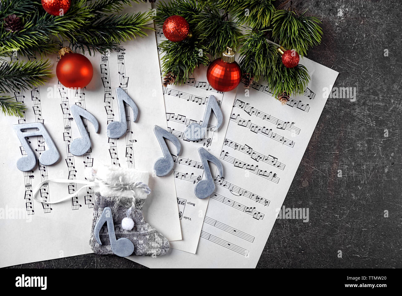 Christmas decorations on music sheets Stock Photo - Alamy