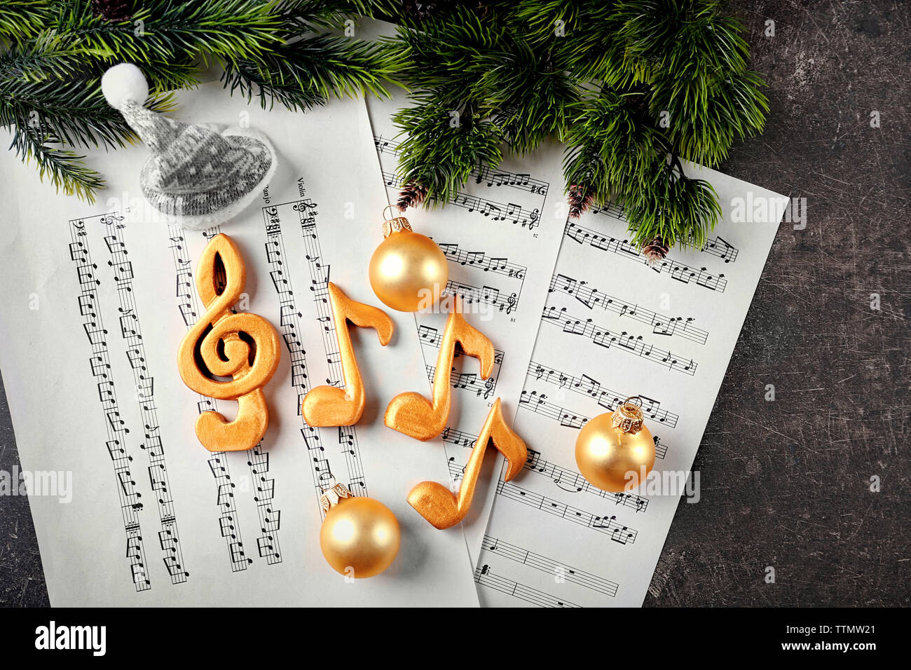 Christmas decorations on music sheets Stock Photo - Alamy