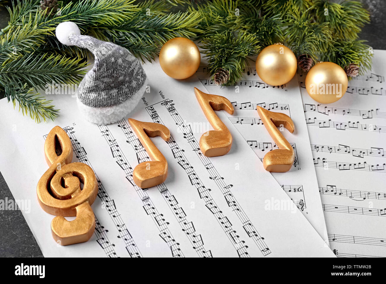 Christmas decorations on music sheets Stock Photo - Alamy