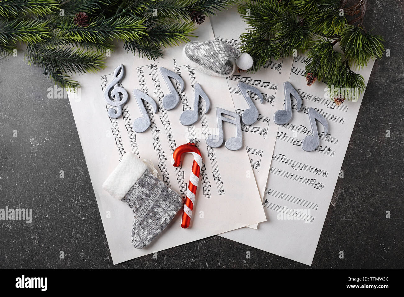 Christmas decorations on music sheets Stock Photo - Alamy