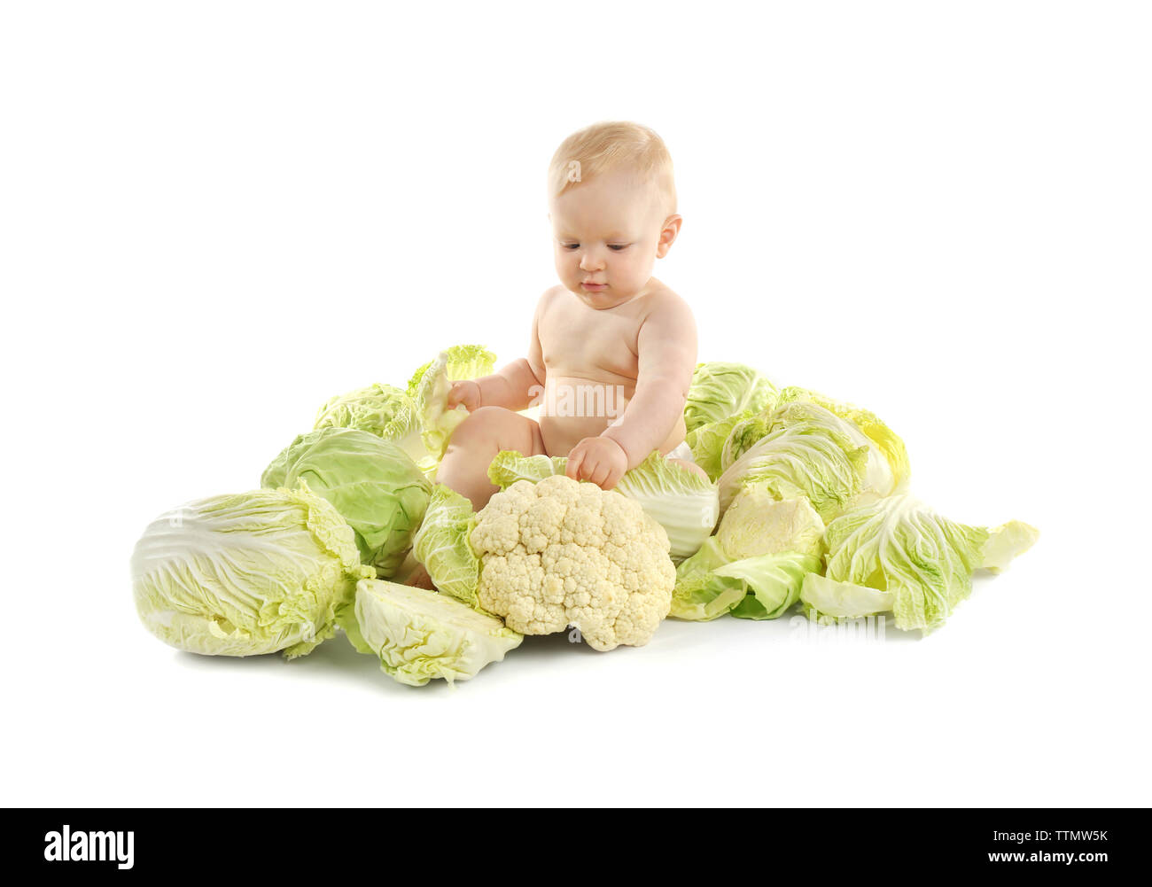 Baby sitting in baby grow hi-res stock photography and images - Alamy