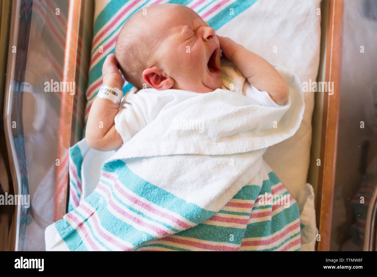 Baby wrapped up incubator hi-res stock photography and images - Alamy